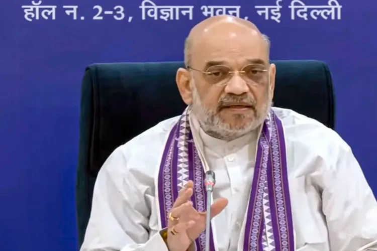 Home Minister speaks to CMs of Assam, UP, Gujarat on flood situation